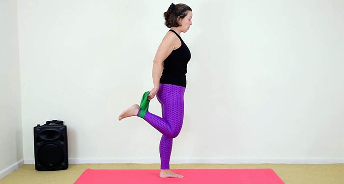 standing-quad-stretch-band - Jane Mackenzie's Pilates Hythe and Folkestone